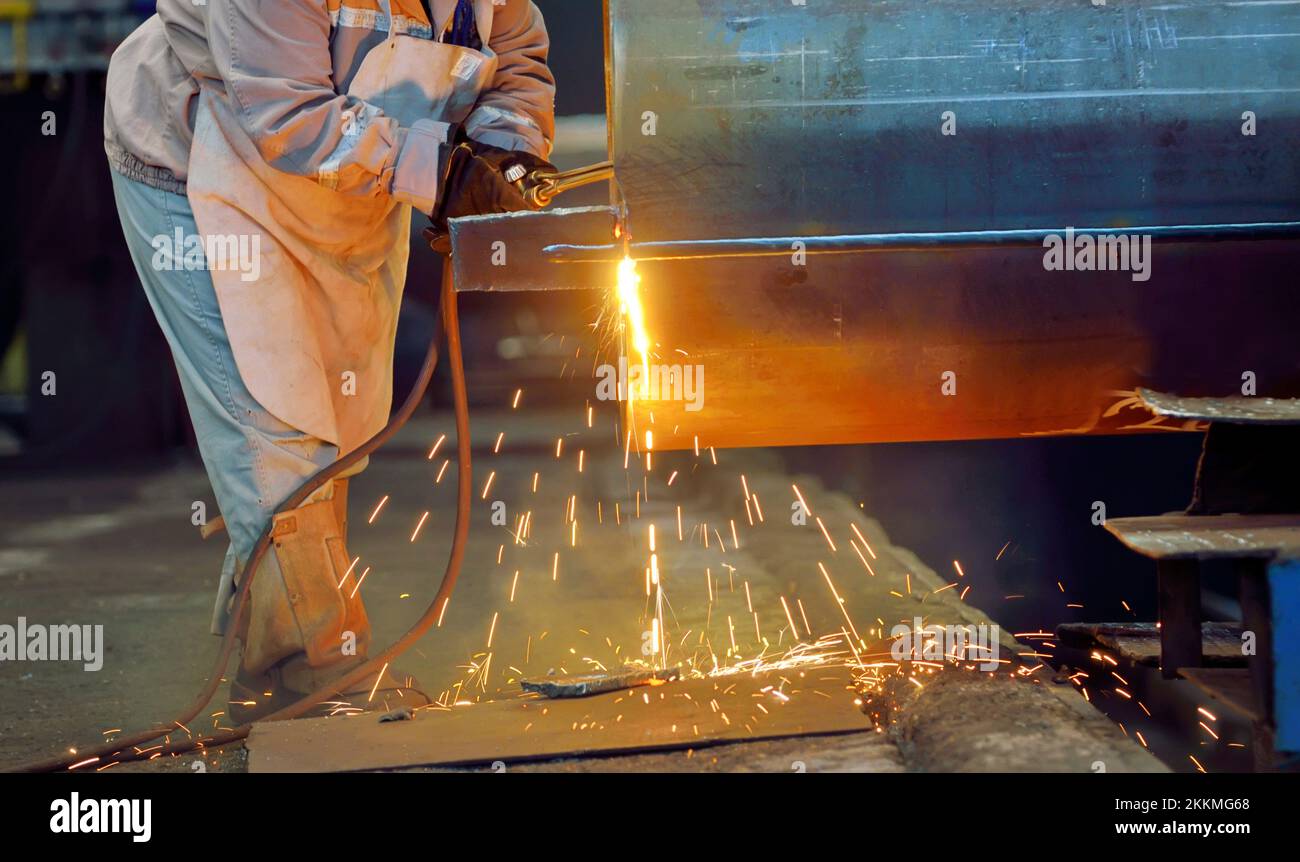 Worker using blowtorch Stock Photo - Alamy
