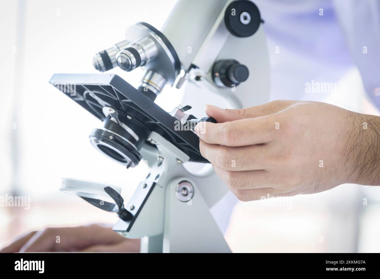 Scientist using light microscope Stock Photo - Alamy Scientist using light microscope Stock Photo - Alamy