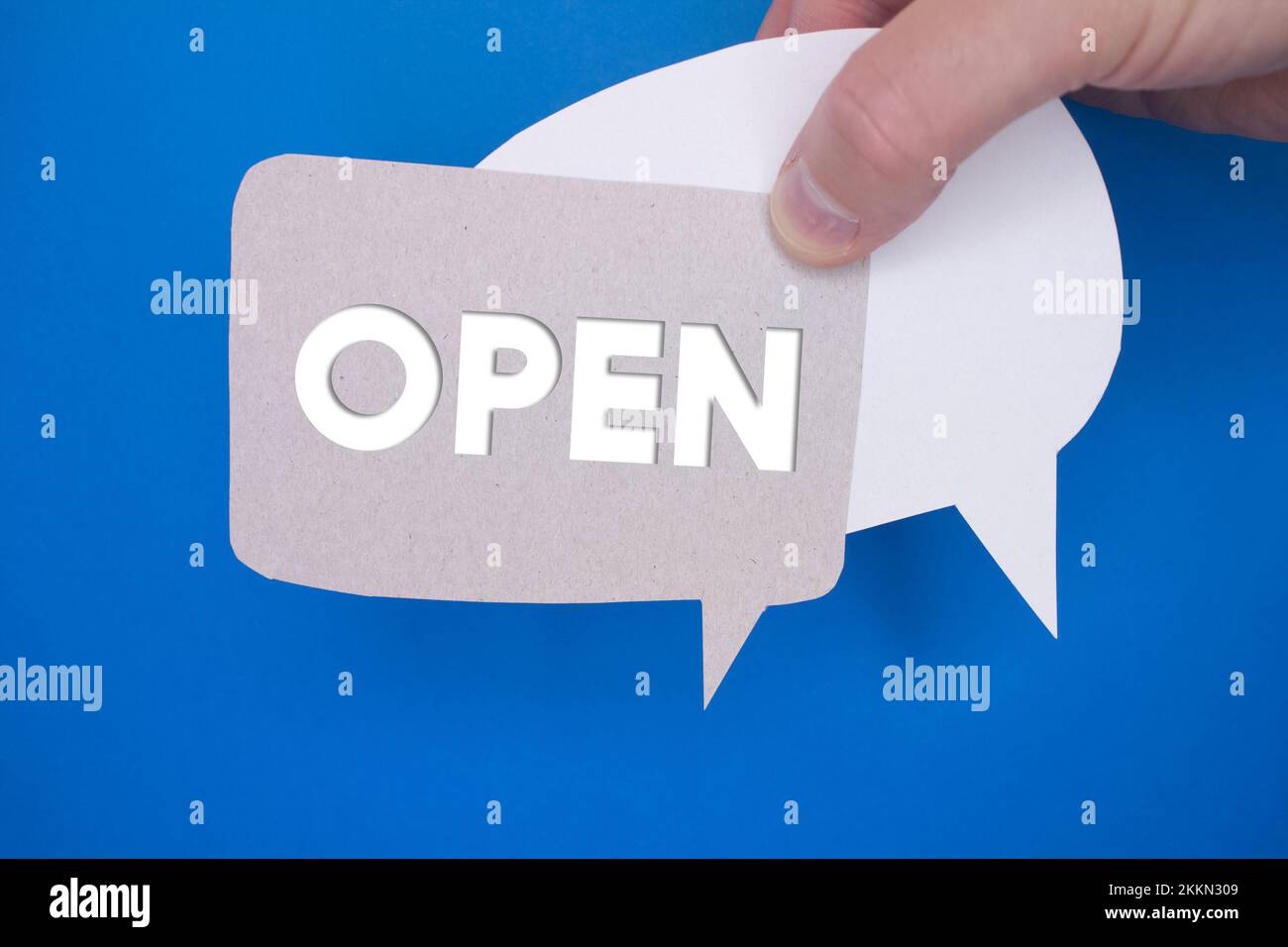 Speech bubble in front of colored background with Open text Stock Photo ...