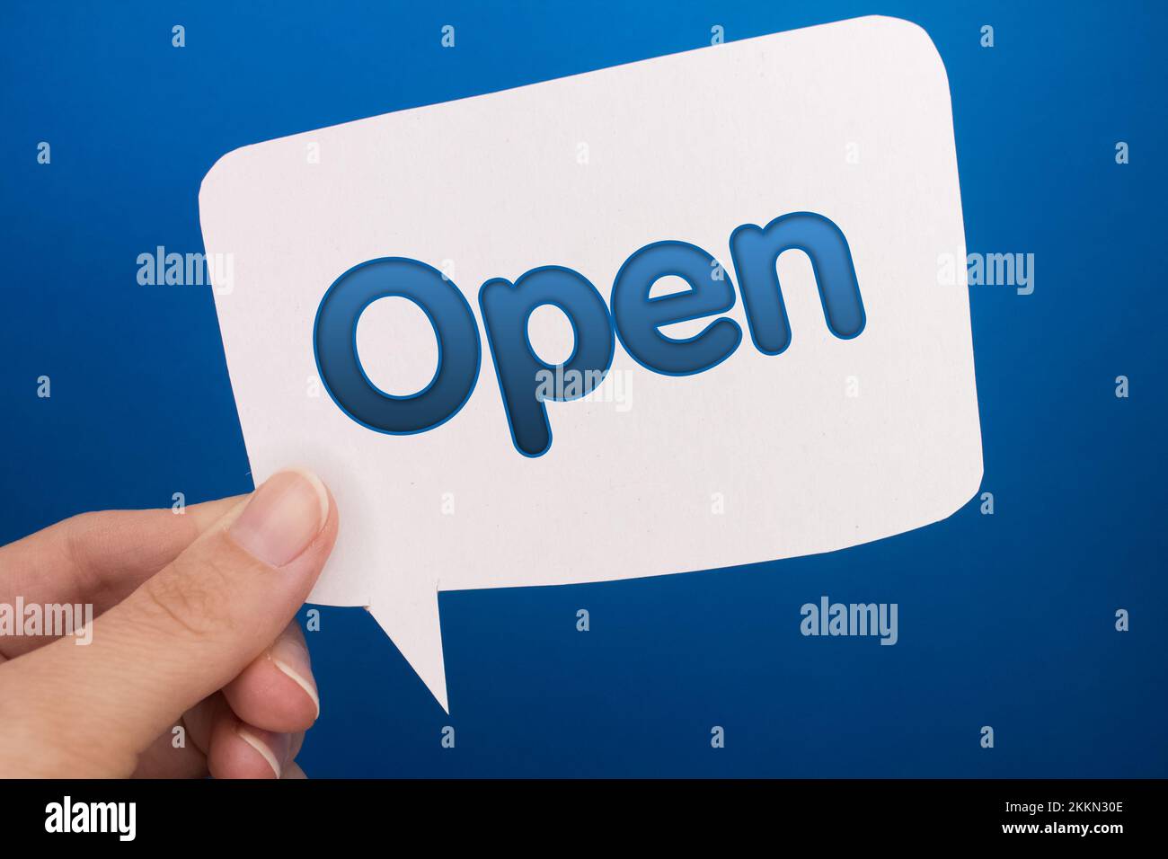 Speech bubble in front of colored background with Open text Stock Photo ...
