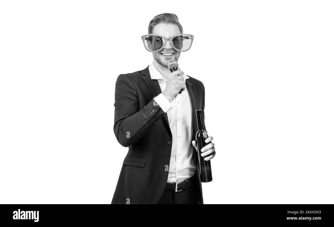 Happy guy conferencier give toast with wine to microphone, toastmaster ...