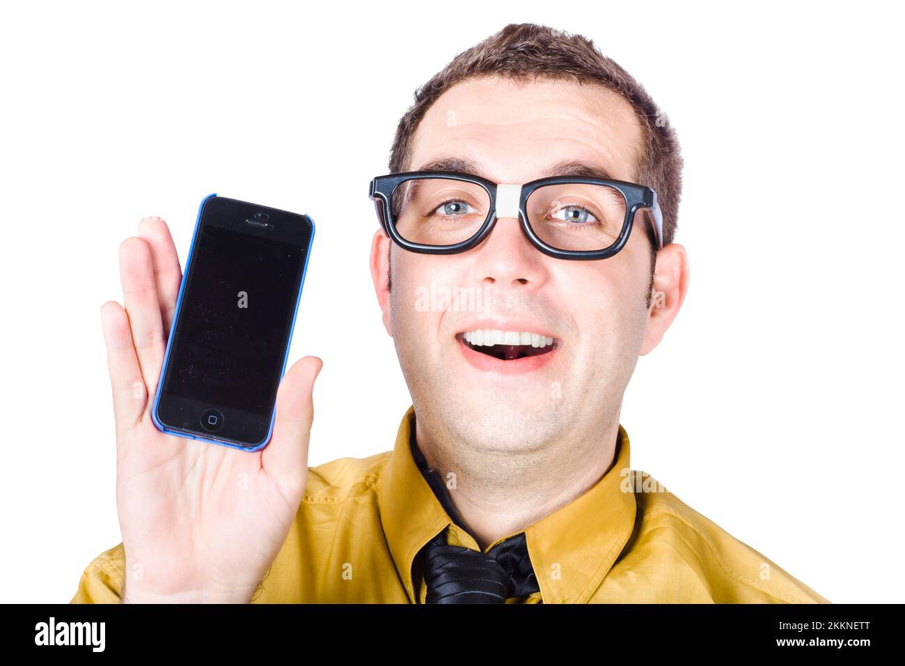 Isolated picture of a amazed dorky man holding a mobile smartphone with ...