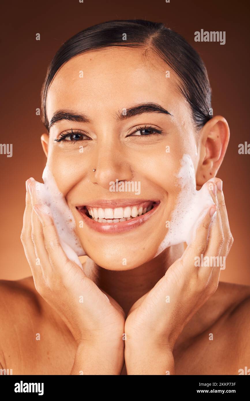 Hands With Foam On Face Beauty With Woman And Cosmetic Product