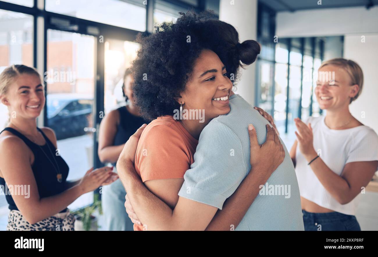 Hug, support and business people at a team building, collaboration and office meeting, party or ...