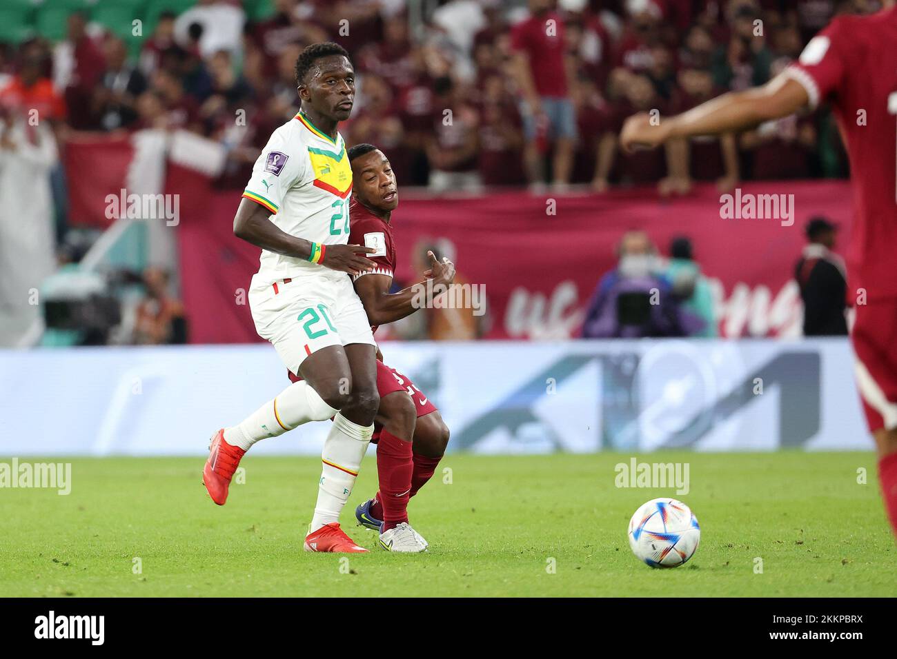 Doha, Qatar. 25th Nov, 2022. Cheikh Dieng of Senegal, Assim Madibo of ...