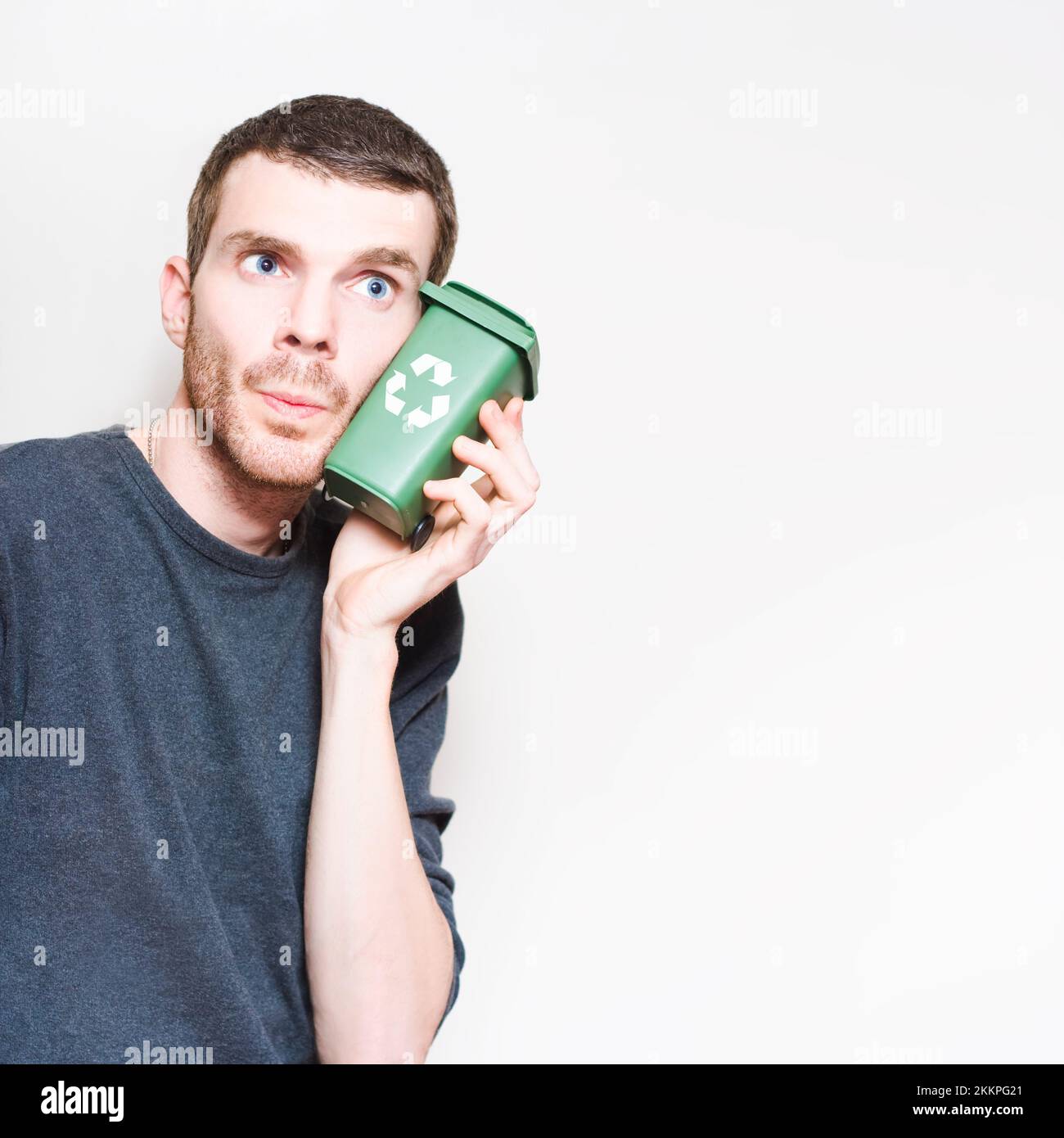 Man thinking about recycling environment hi-res stock photography and ...