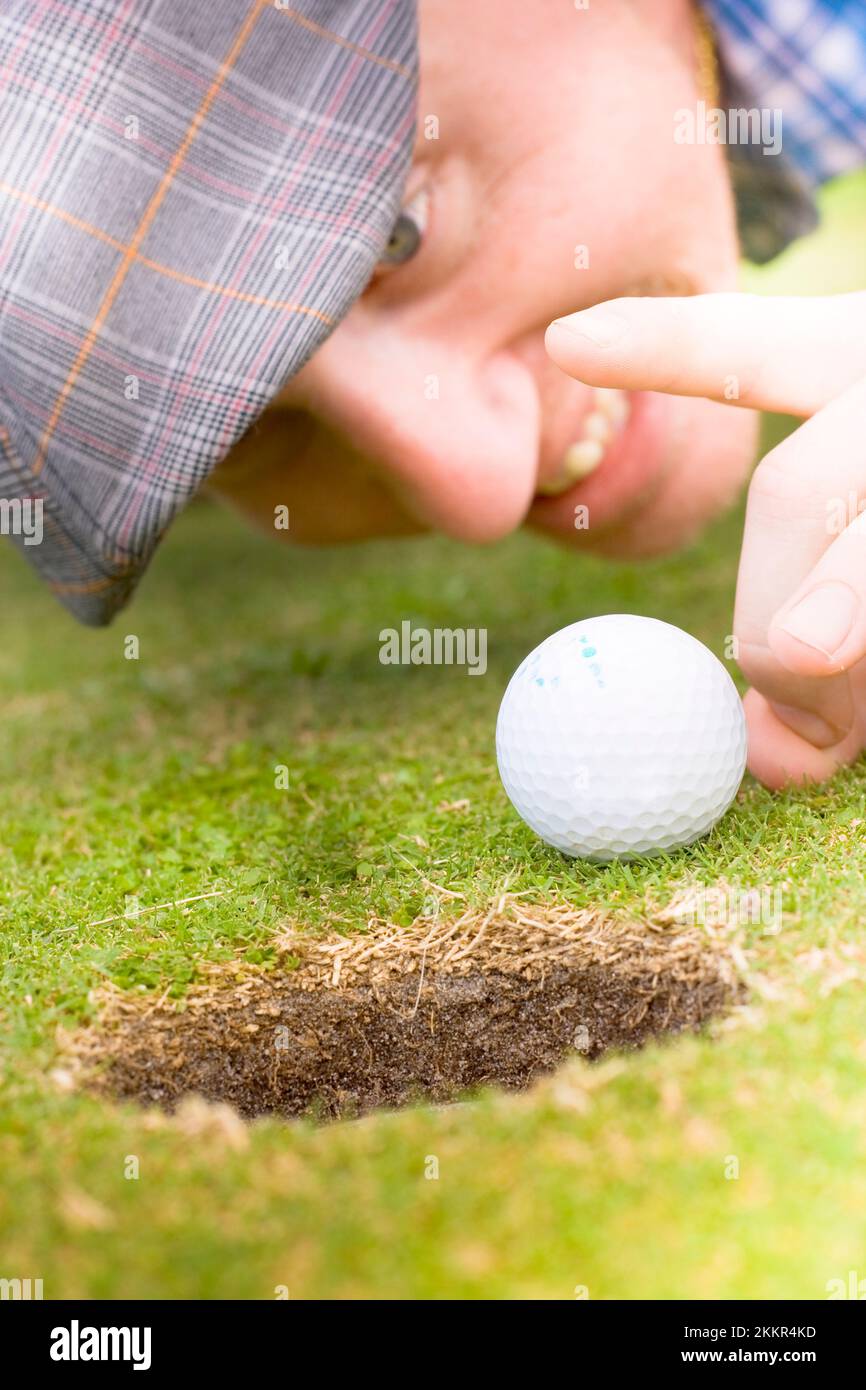 Man push ball in golf hi-res stock photography and images - Alamy