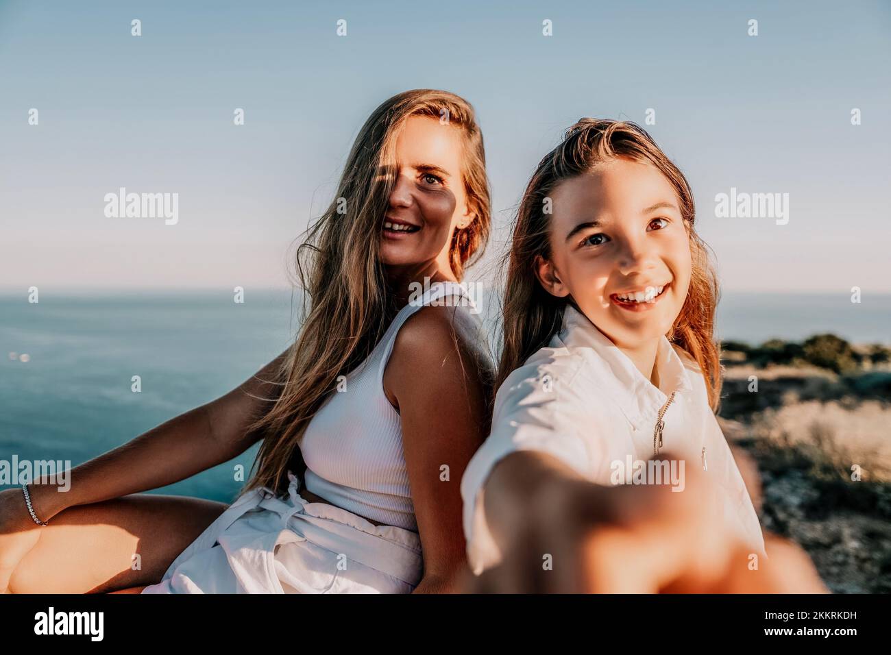 Sea family vacation together, happy mom and teenage daughter hugging ...