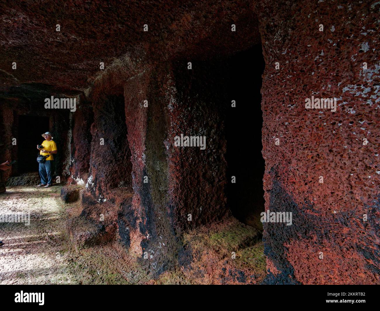Tourist visiting Arvalem Caves excavated in to the laterite hill in 6th ...
