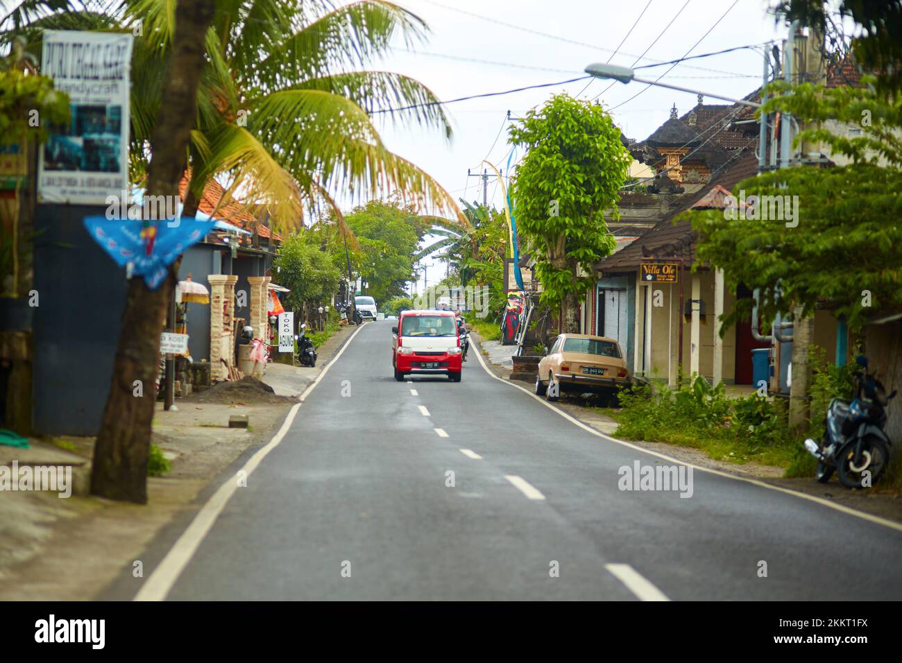 A picturesque road on the island of Bali. The mysterious trails of a ...