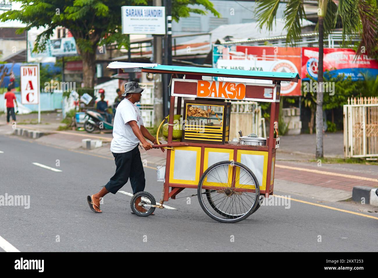 Small private businesses in Asia. Selling food from a mobile counter ...