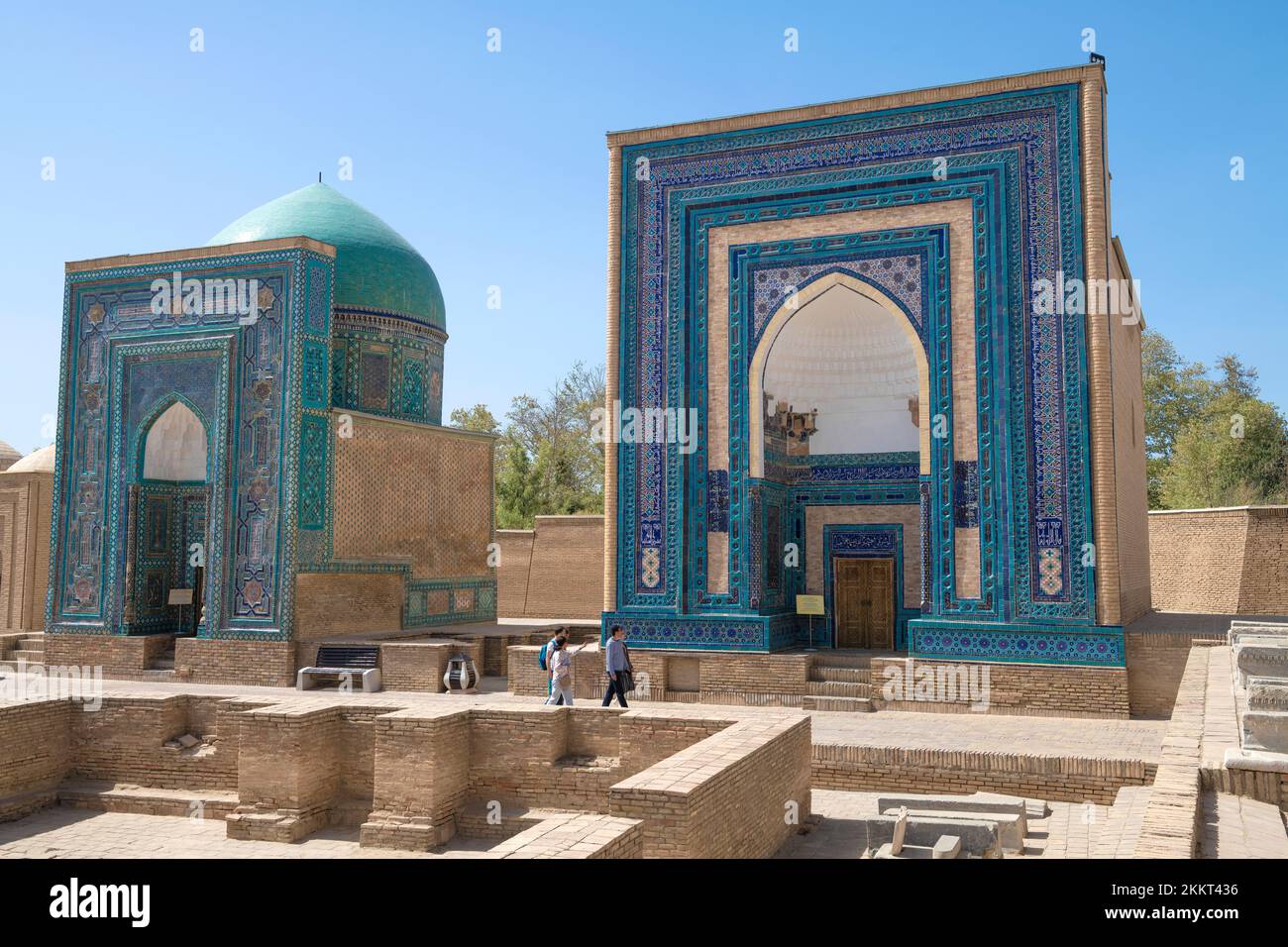 SAMARKAND, UZBEKISTAN - SEPTEMBER 12, 2022: Two medieval mausoleums on ...