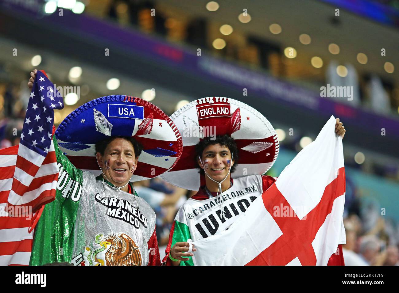 Doha, Qatar. 25th Nov, 2022. Mexican fans, with the flag of England and ...
