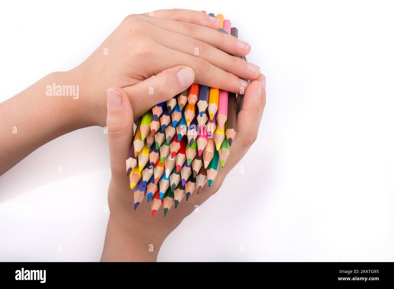 Hand holding Color Pencils on a white background Stock Photo - Alamy