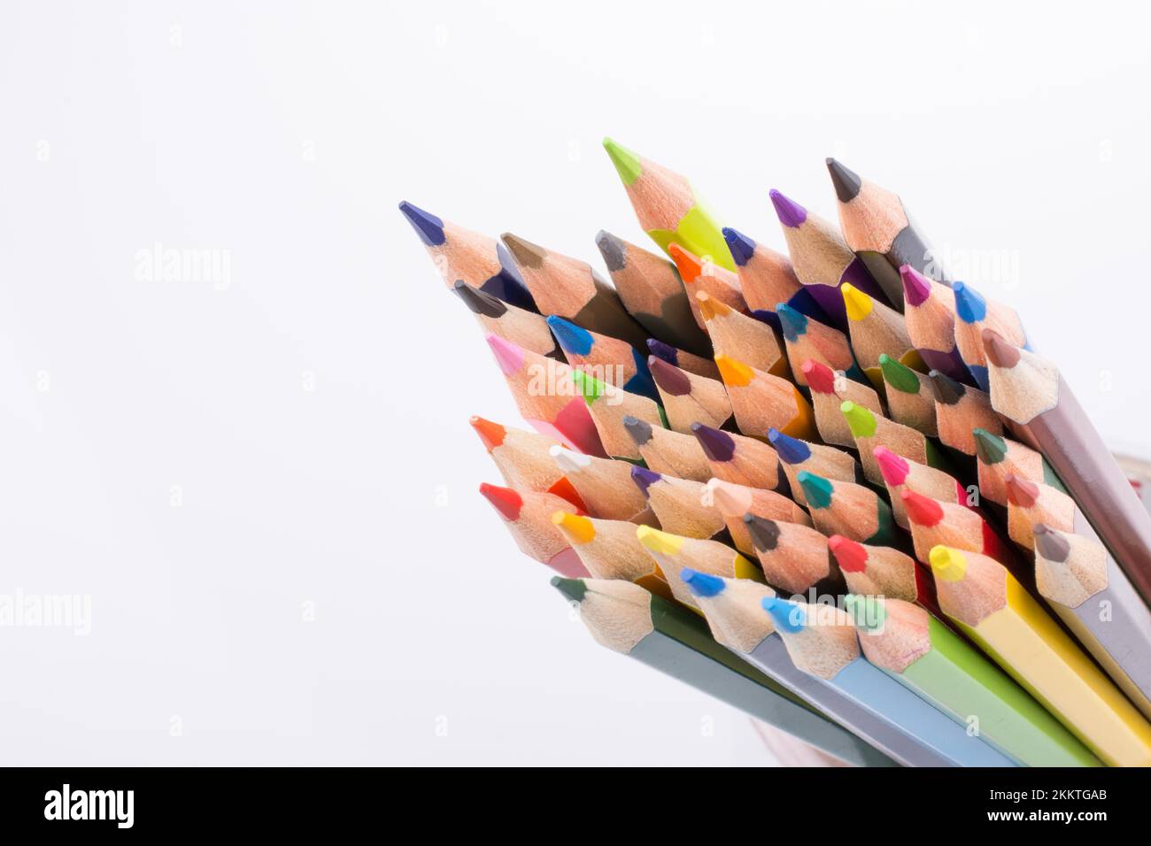 Color Pencils on a tape on a white background Stock Photo - Alamy