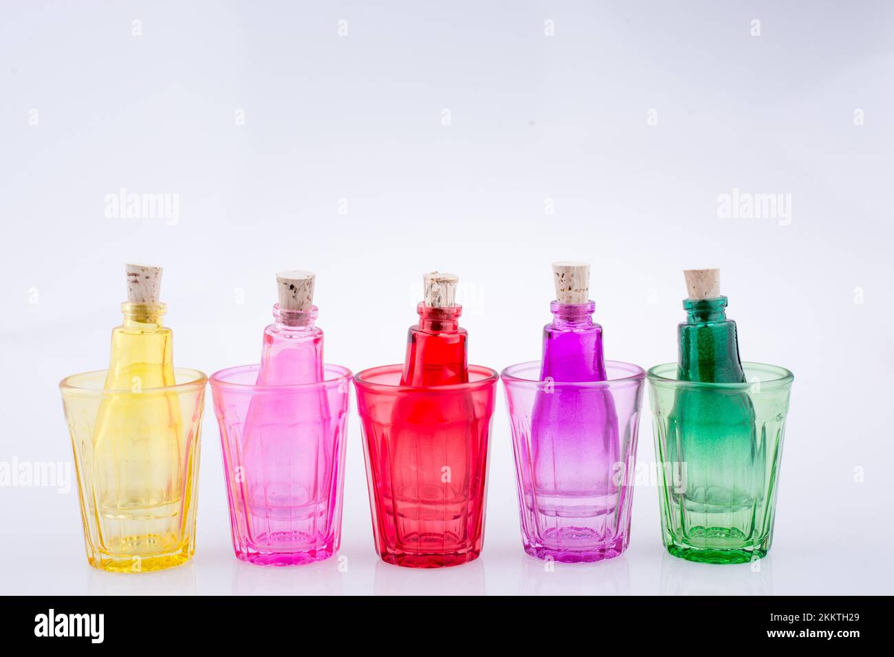 Drinking glasses of various color with patterns Stock Photo - Alamy