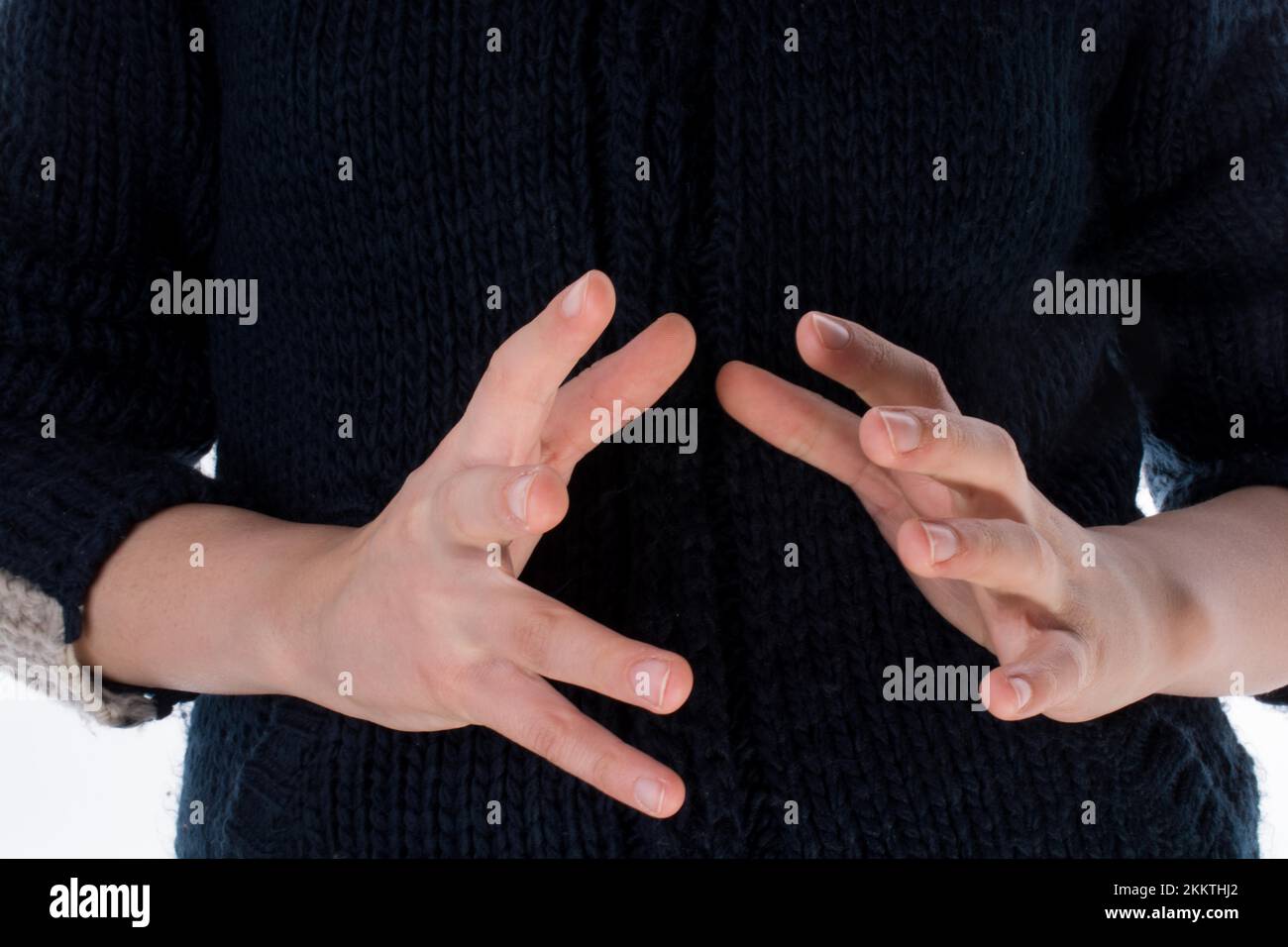 Hand making a gesture on a white background Stock Photo - Alamy