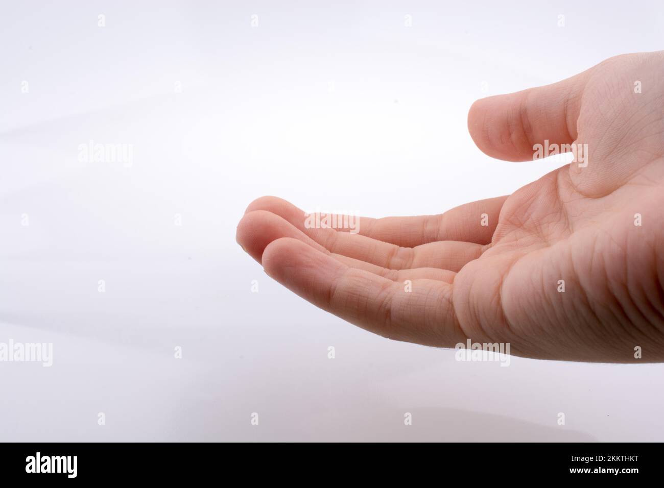 Hand open for a gesture isolated on white background Stock Photo - Alamy