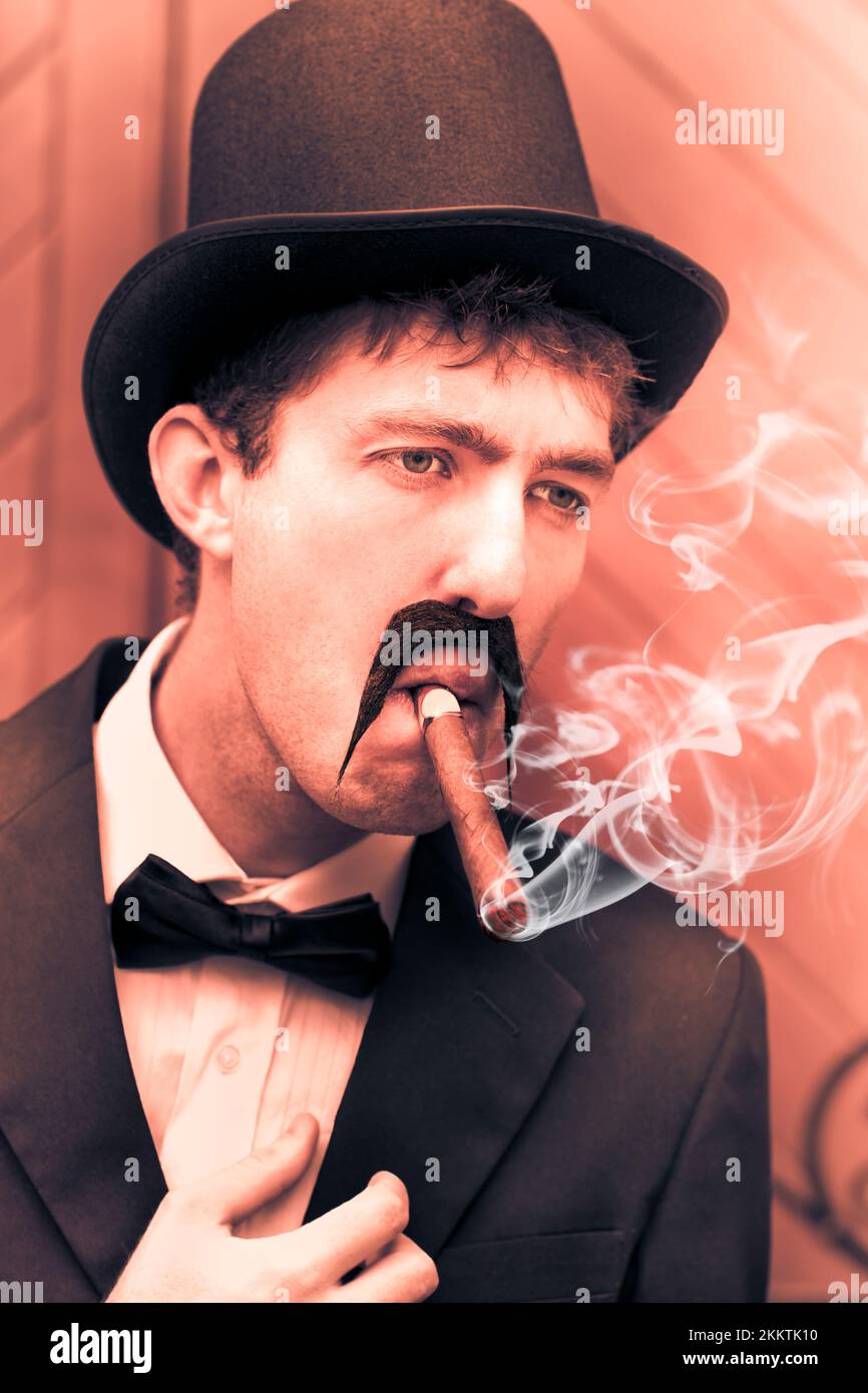 Man smoking cigar 1920s hi-res stock photography and images - Alamy