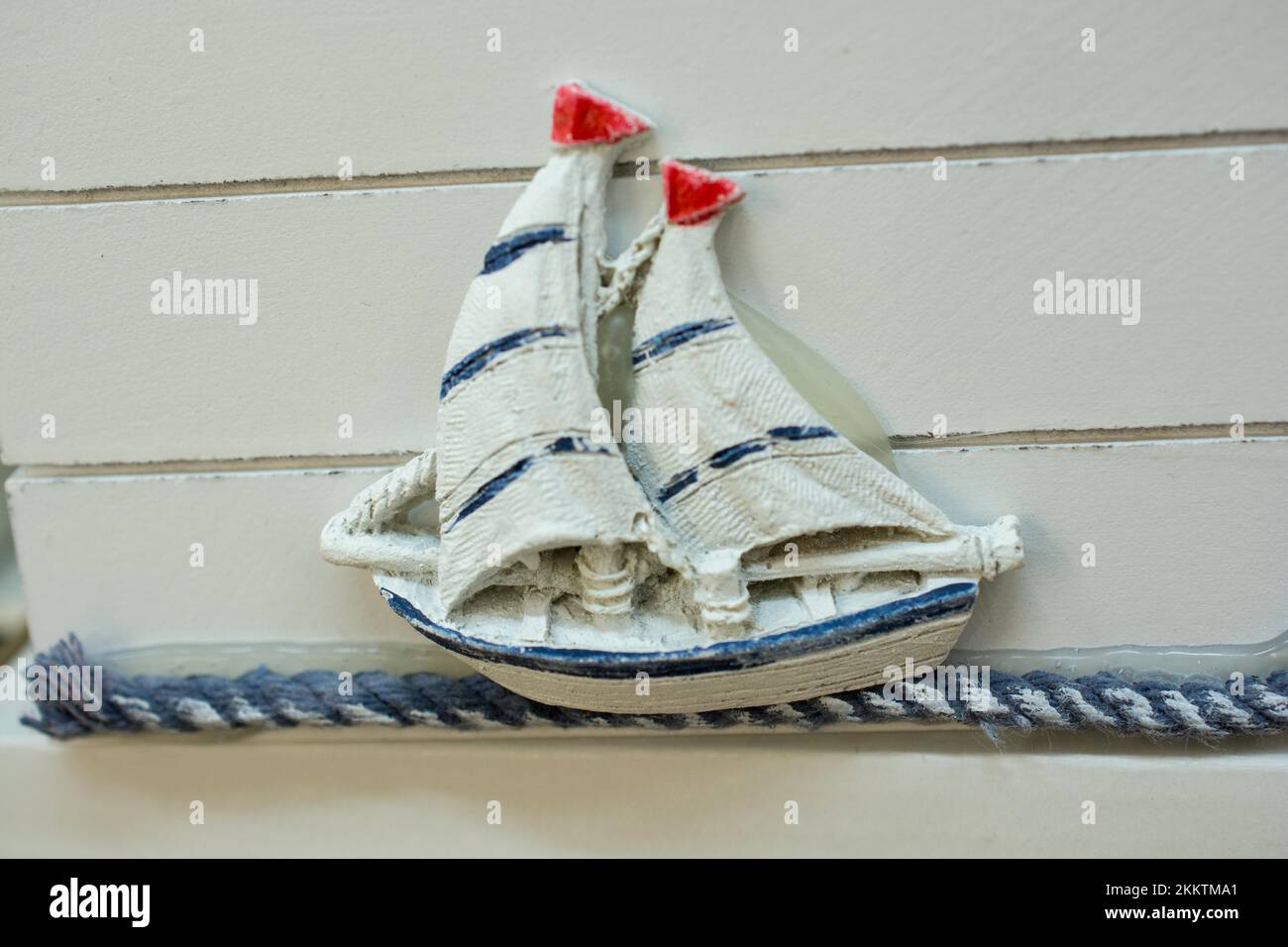 Mini size little colorful model sailboat in view Stock Photo - Alamy