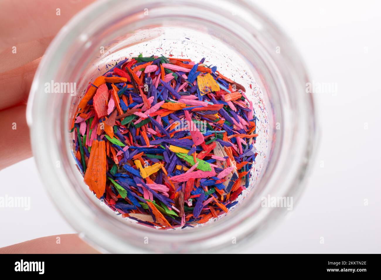 Little perfume glass bottle in hand on a white background Stock Photo ...