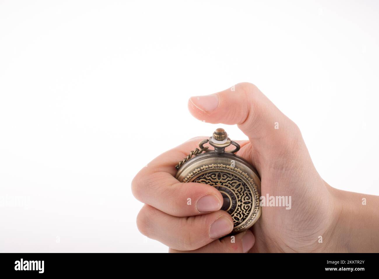 Hand holding a retro styled pocket watch in hand Stock Photo - Alamy