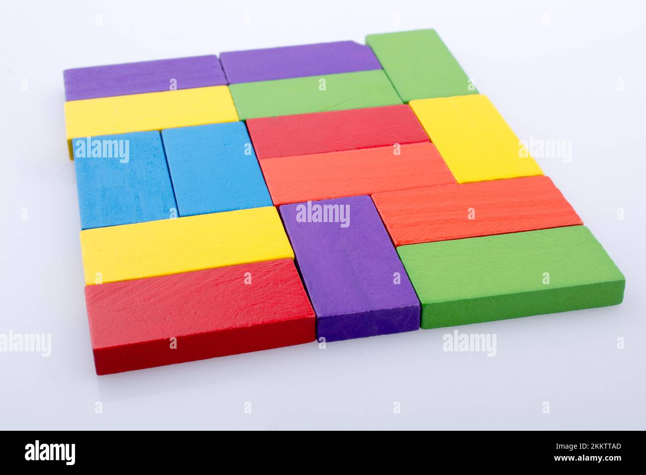 Colorful Domino Blocks on a white background Stock Photo - Alamy