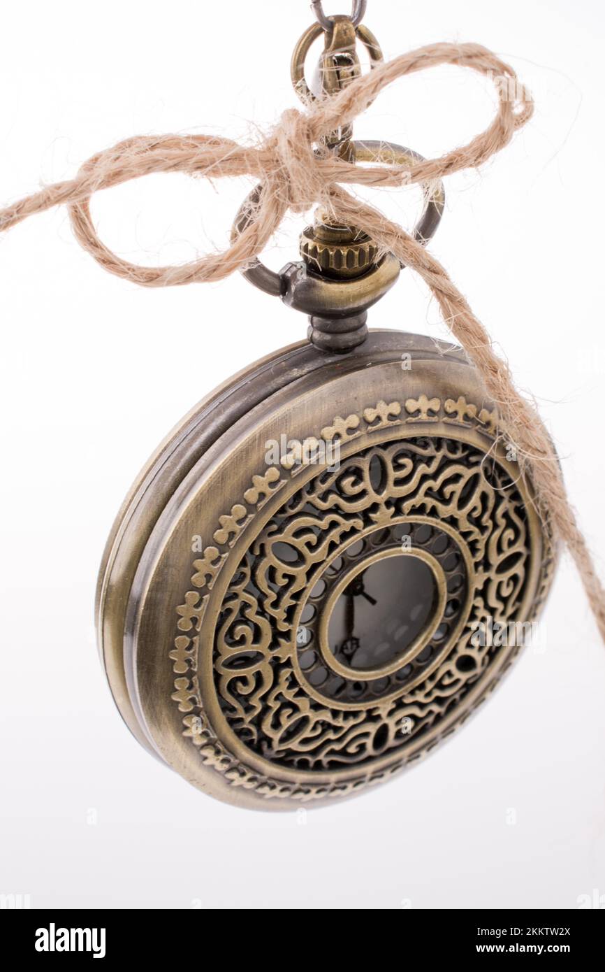 Retro style pocket watch on white background Stock Photo - Alamy