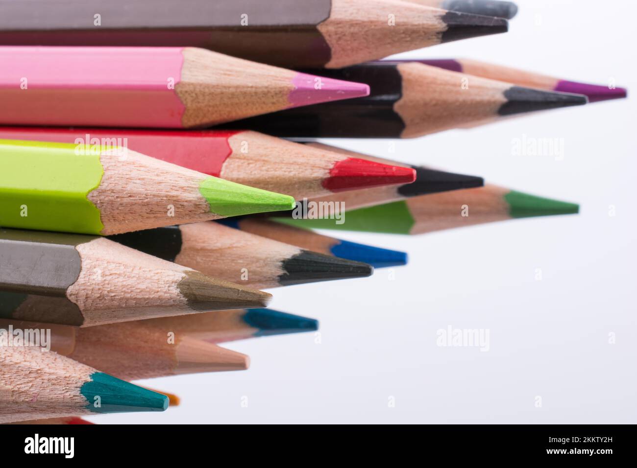 Color Pencils of various colors on a white background Stock Photo - Alamy