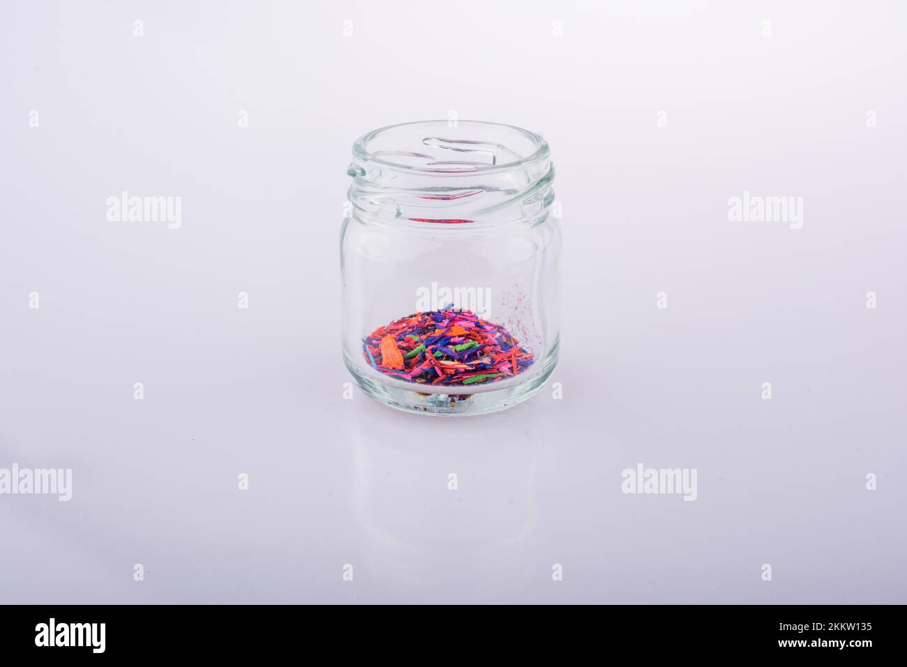 Little perfume glass bottle on a white background Stock Photo - Alamy