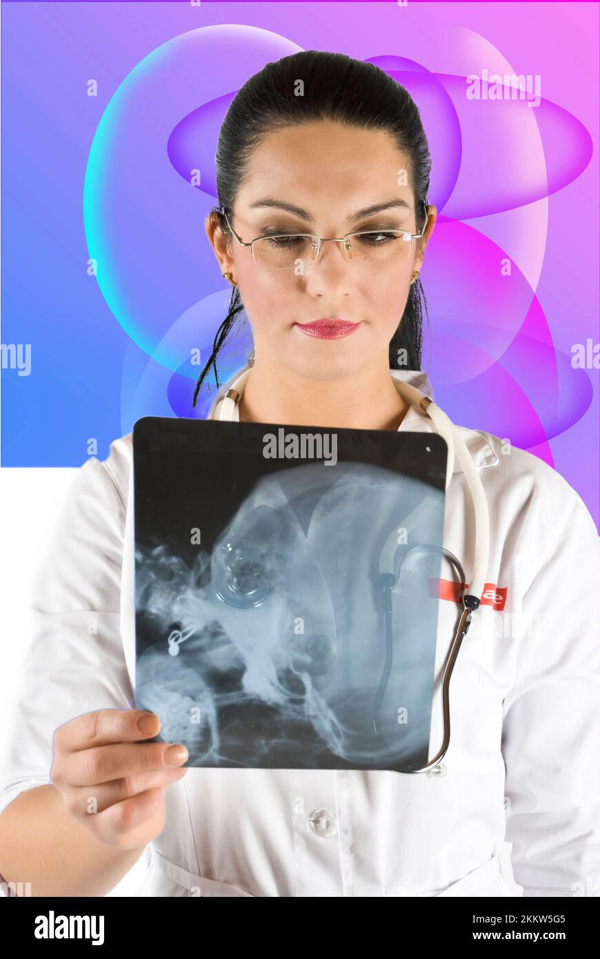 Young doctor examine a head x-ray on white background Stock Photo - Alamy