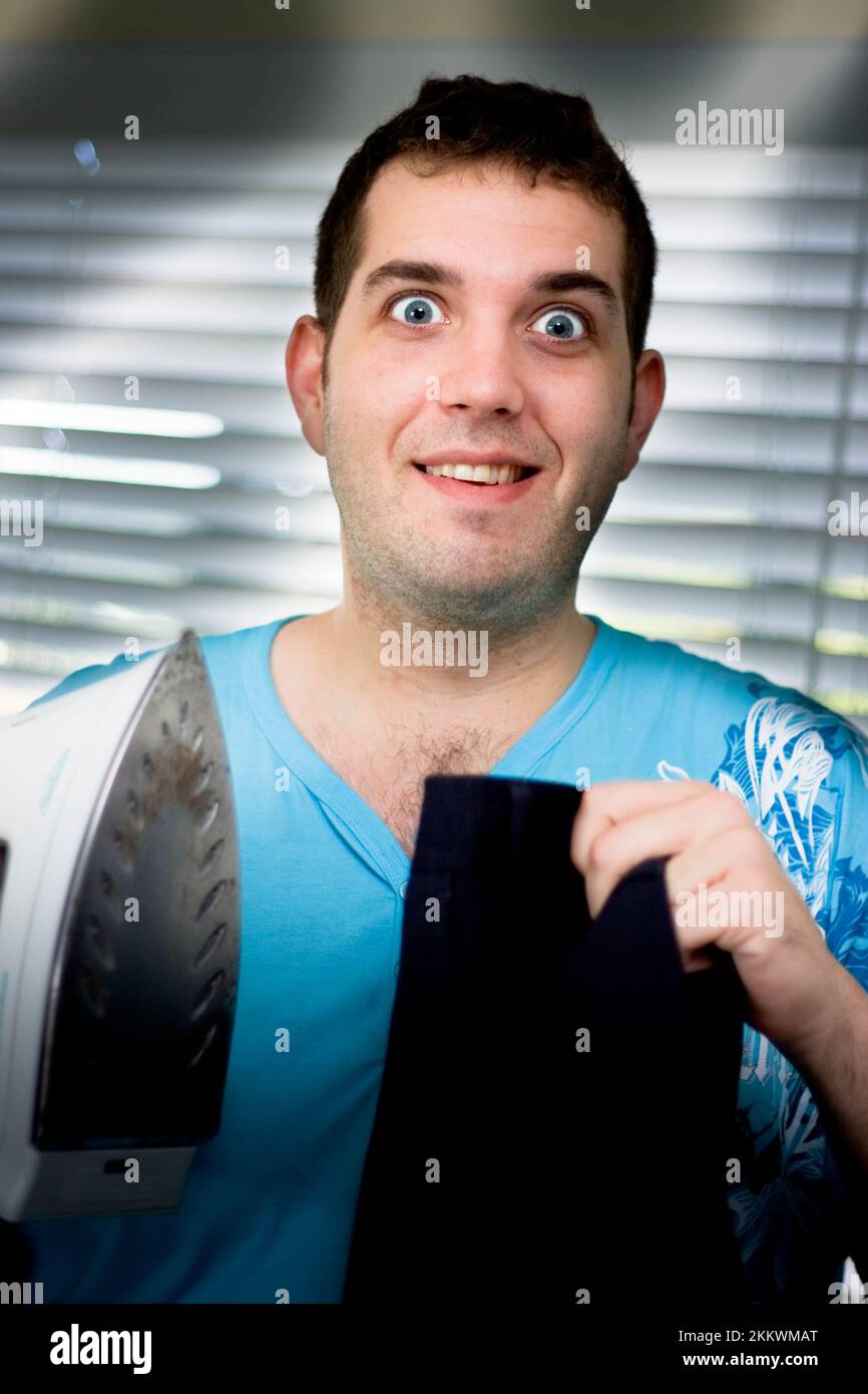 Men housework humour hi-res stock photography and images - Alamy
