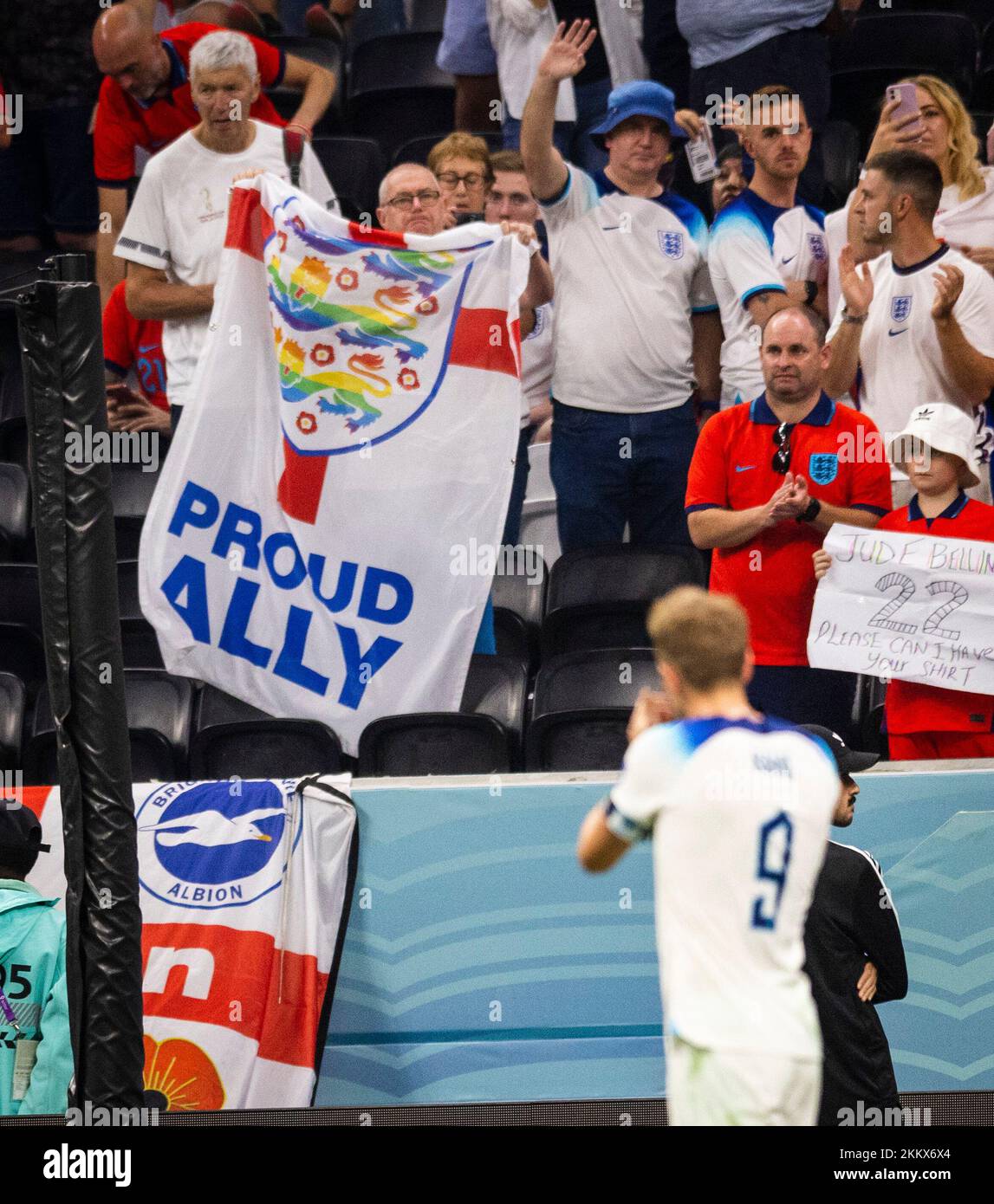 Doha, Qatar. 25th Nov, 2022. English fans with rainbow flag infant of ...