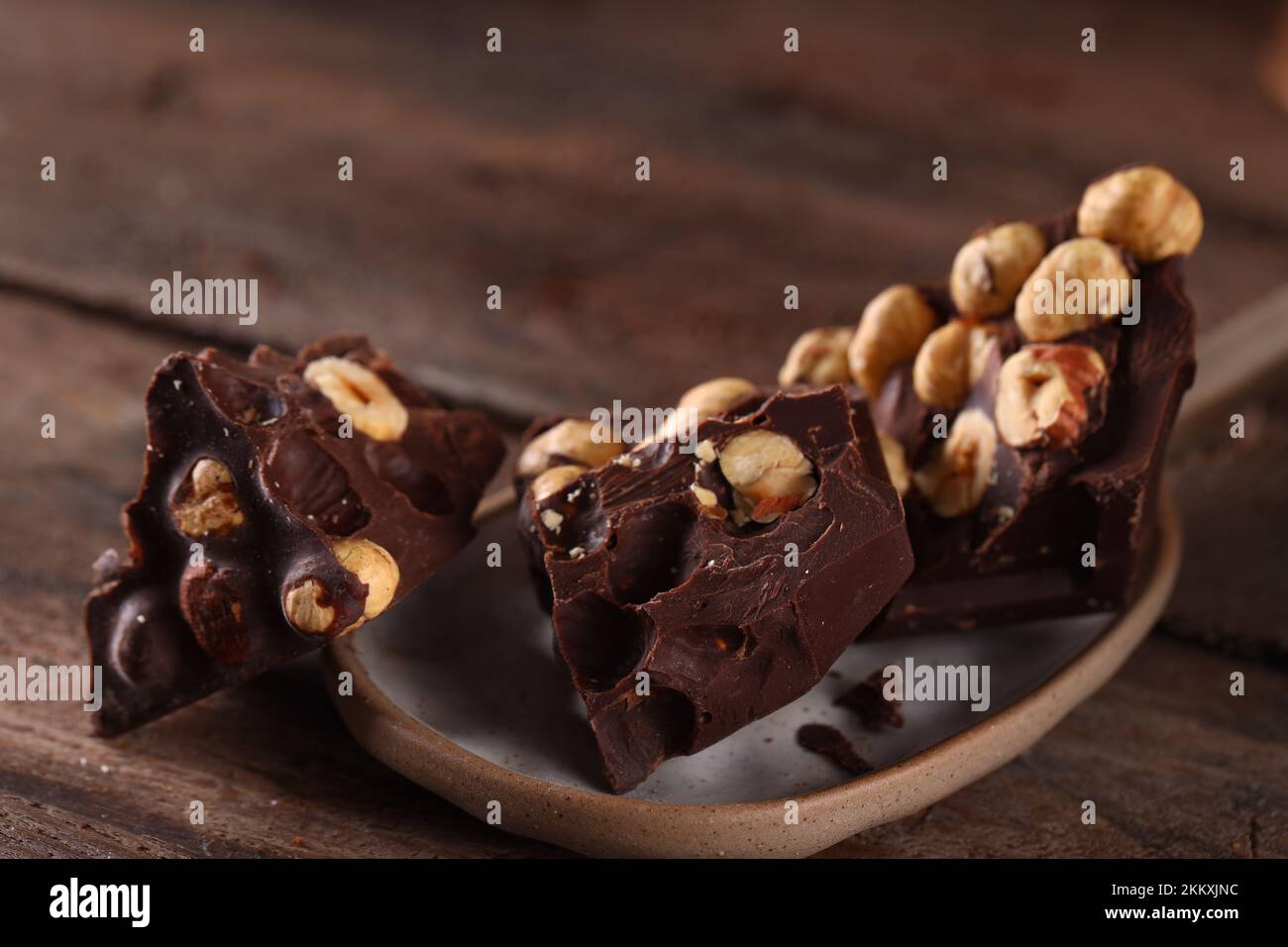 natural dark chocolate with nuts food Stock Photo - Alamy