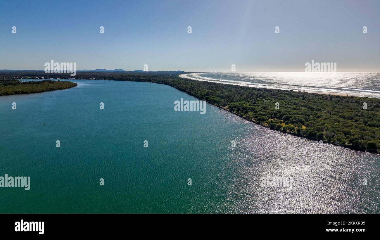 An aerial view of North Shore beach in Australia with blue ocean and ...