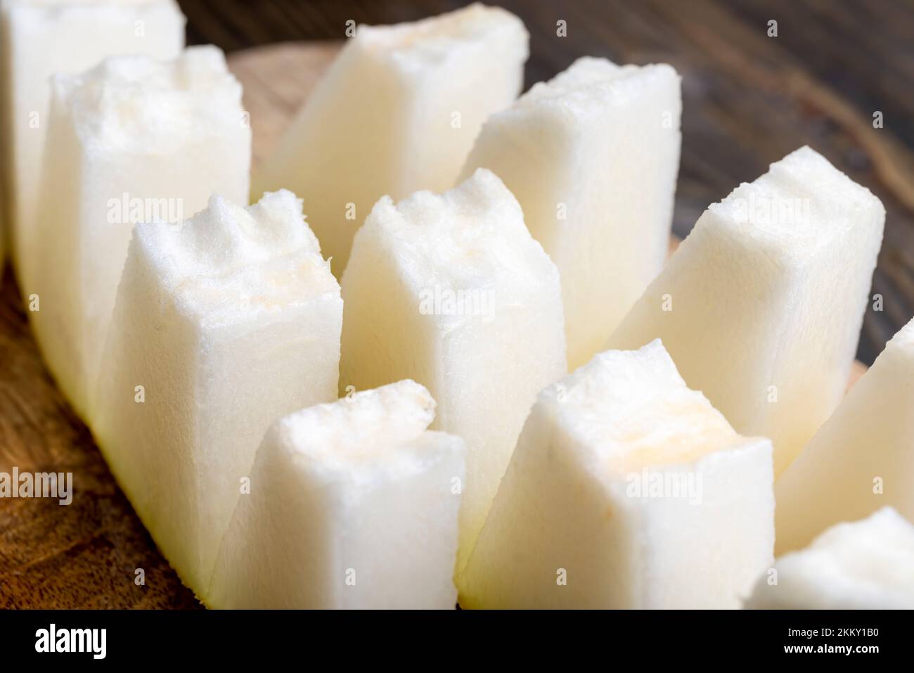Sliced ripe melon , juicy melon divided into pieces during cooking ...