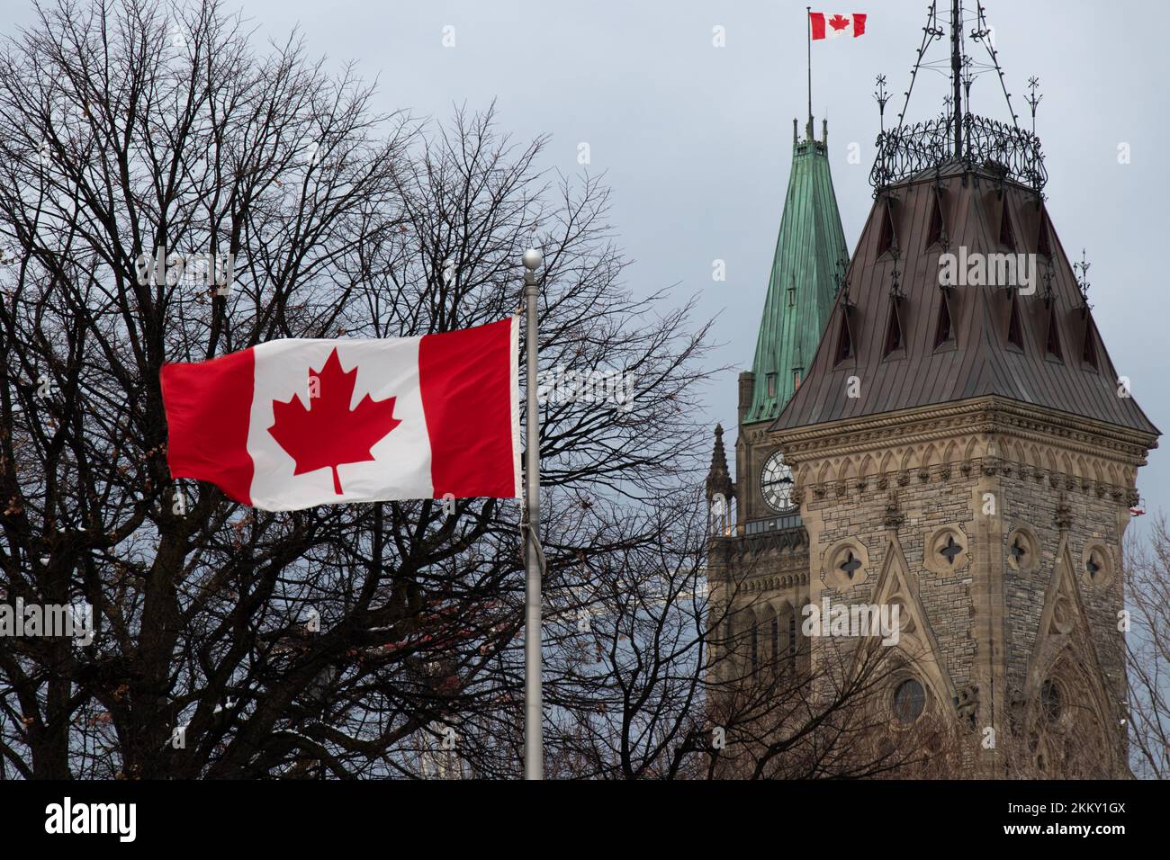 The Canadian Flag flies in full in front of the Parliament of Canada ...