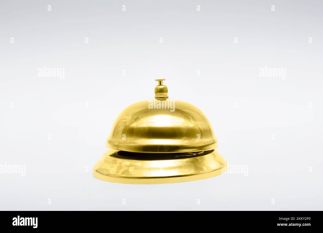 Gold front desk bell hi-res stock photography and images - Alamy