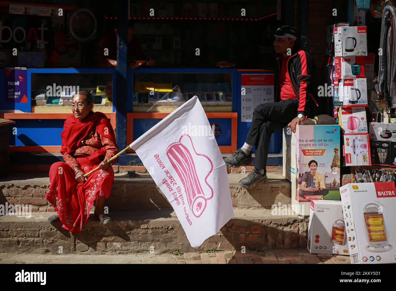 Nepal. 26th Nov, 2022. Supporters carries the flag of Nepal Workers and ...