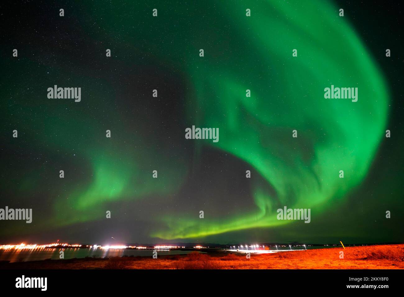 The northern lights over the town of Borgarnes on the west coast of ...