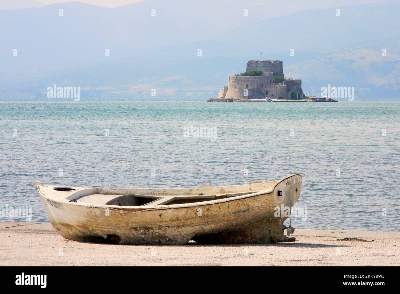 Dry boat on the shore, Bourtzi Castle, 15th-century Venetian fort on ...