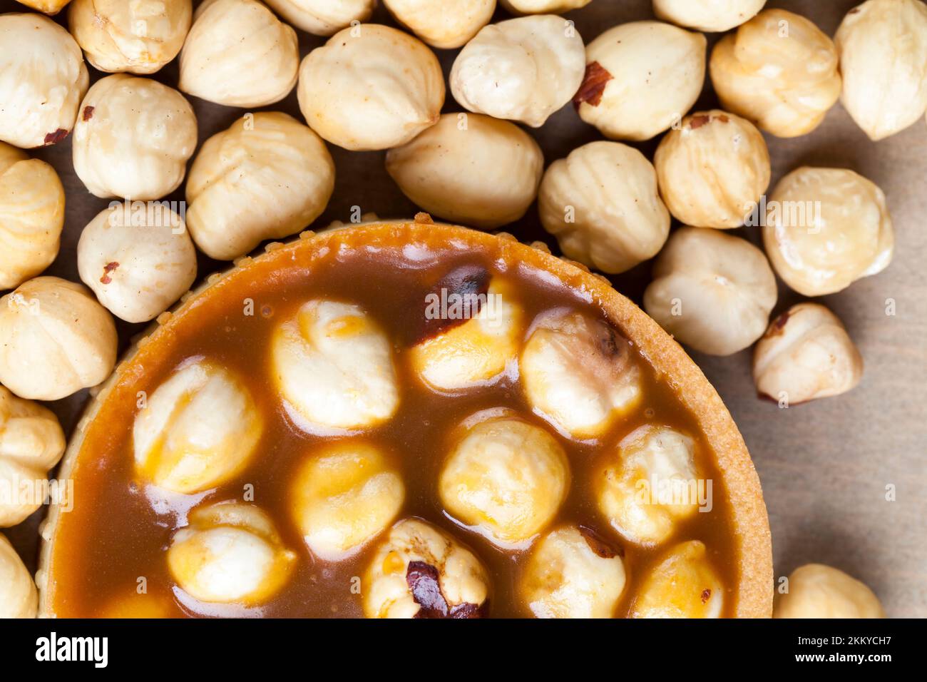 tartlet with salted caramel and hazelnuts, round tartlet with soft ...