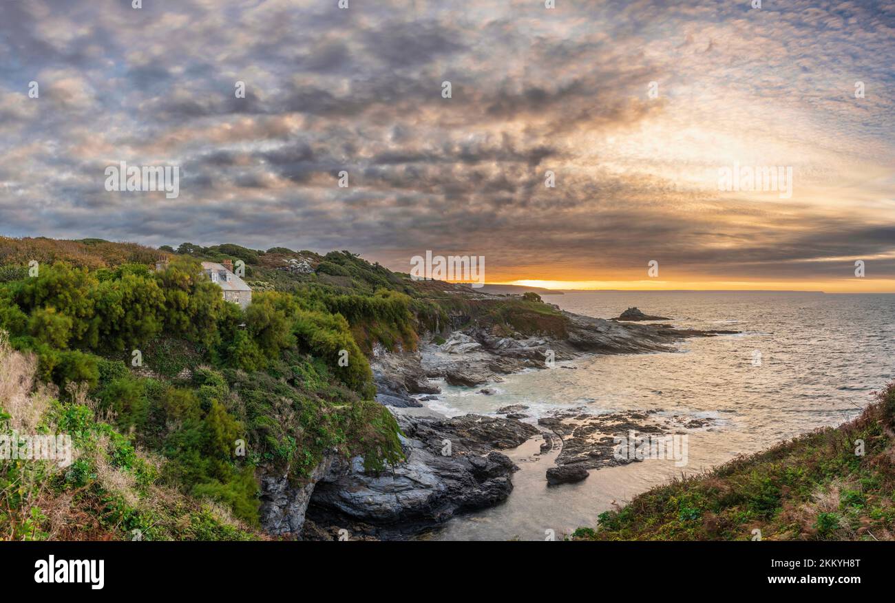 Moody landscape sunrise image at Prussia Cove in Cornwall England with ...