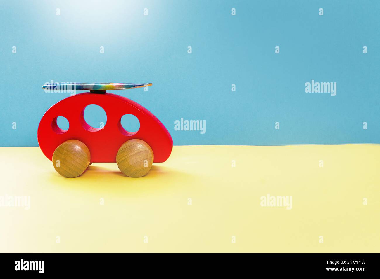 Toy red car with board for surfing on the beach. Active lifestyle ...