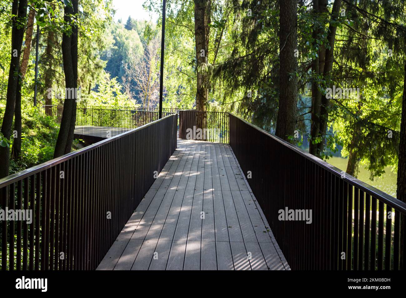 Wooden pedestrian walking deck bridge hi-res stock photography and ...