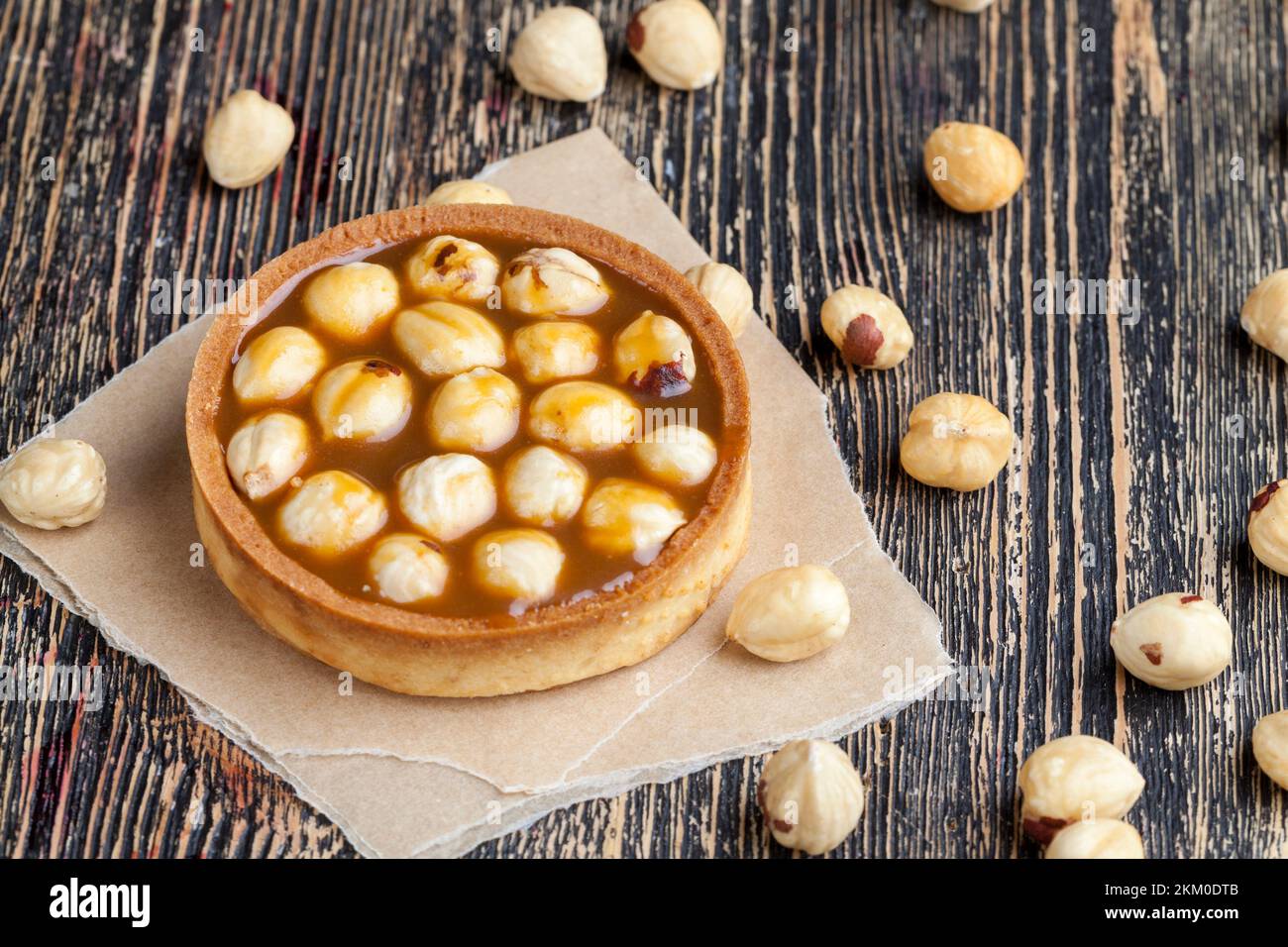 tartlet with salted caramel and hazelnuts, round tartlet with soft ...