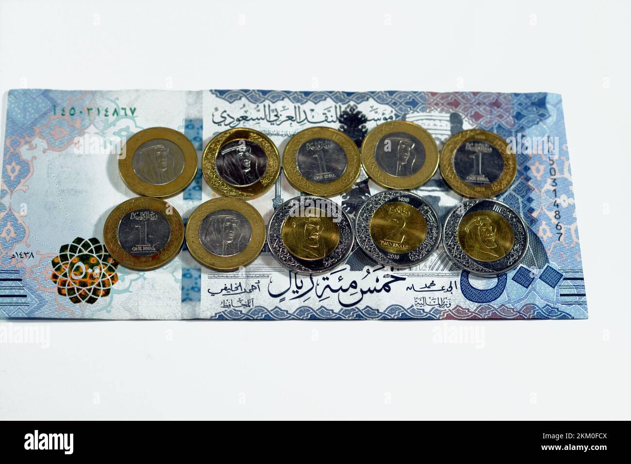 500 SAR five hundred Saudi Arabia riyals cash money banknote with pile ...