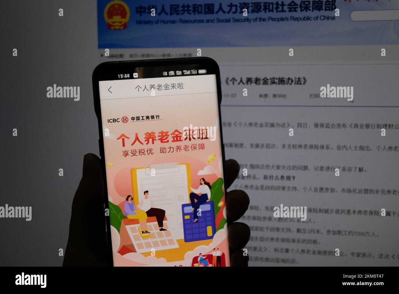 A citizen checks information about his personal pension via his mobile ...