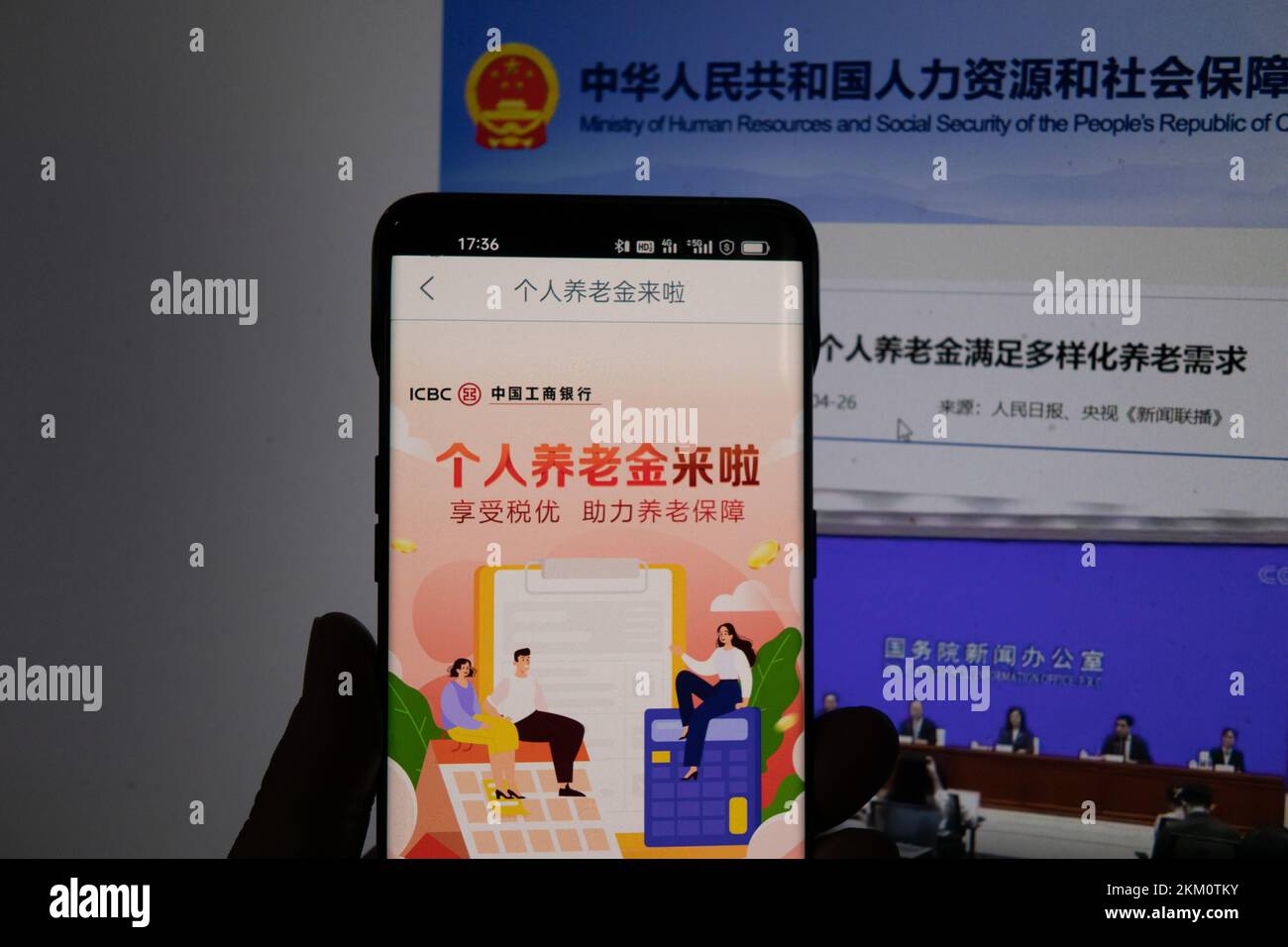 A citizen checks information about his personal pension via his mobile ...