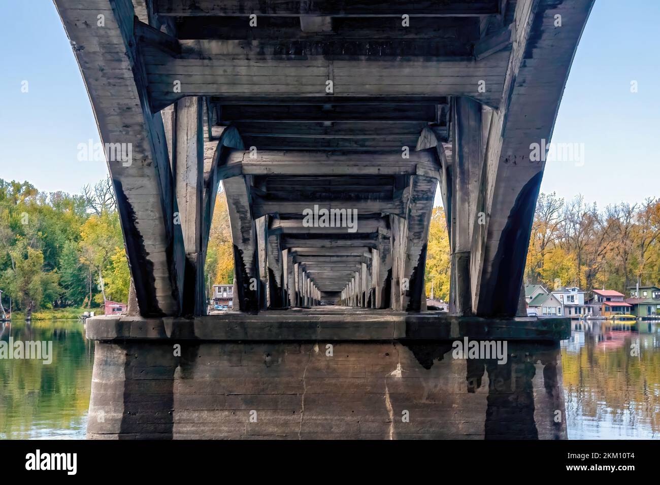 Underneath view of the Latsch Island Bridge with houseboats on the ...